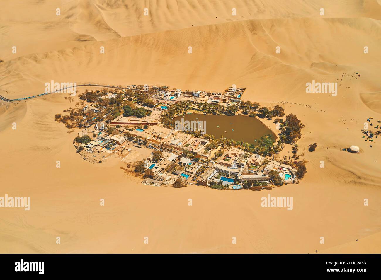 The Huacachina oasis is a natural oasis in the middle of the desert ...