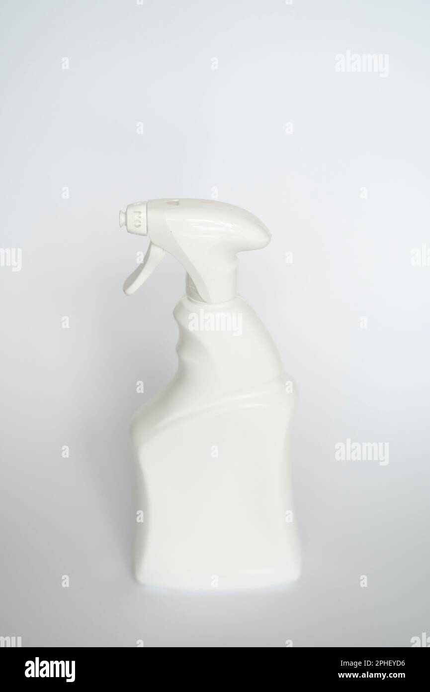 White plastic spray bottle for liquid cleaning products isolated on ...