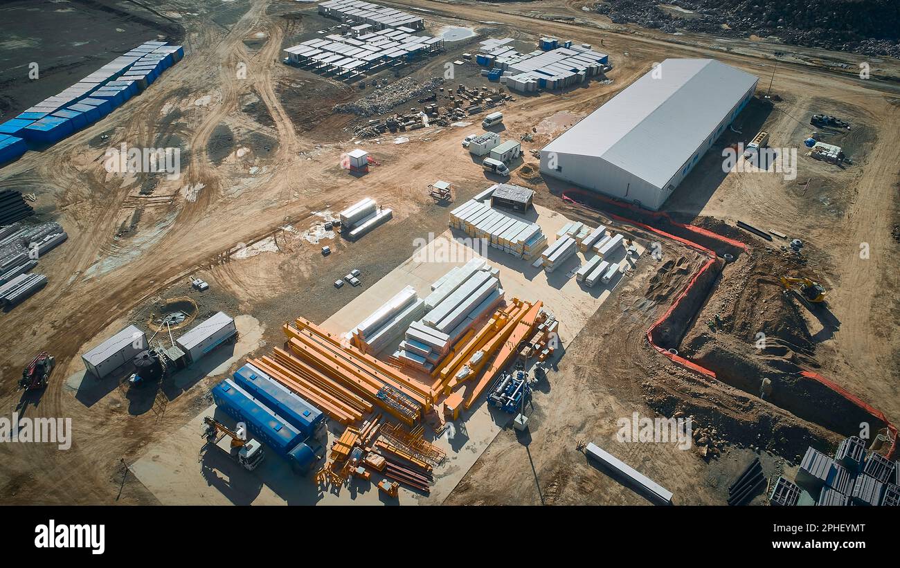 Aerial view of construction site. Outdoor warehouse of building ...