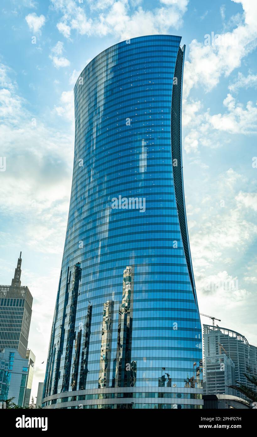 Modern skyscraper, business office building with glass facade. Doha ...