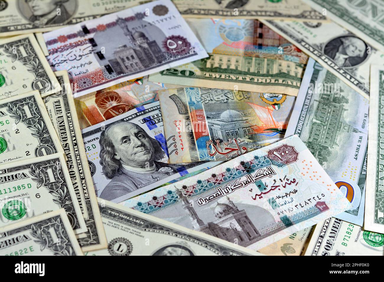 Egyptian pounds currency with American USA dollars cash money banknotes ...