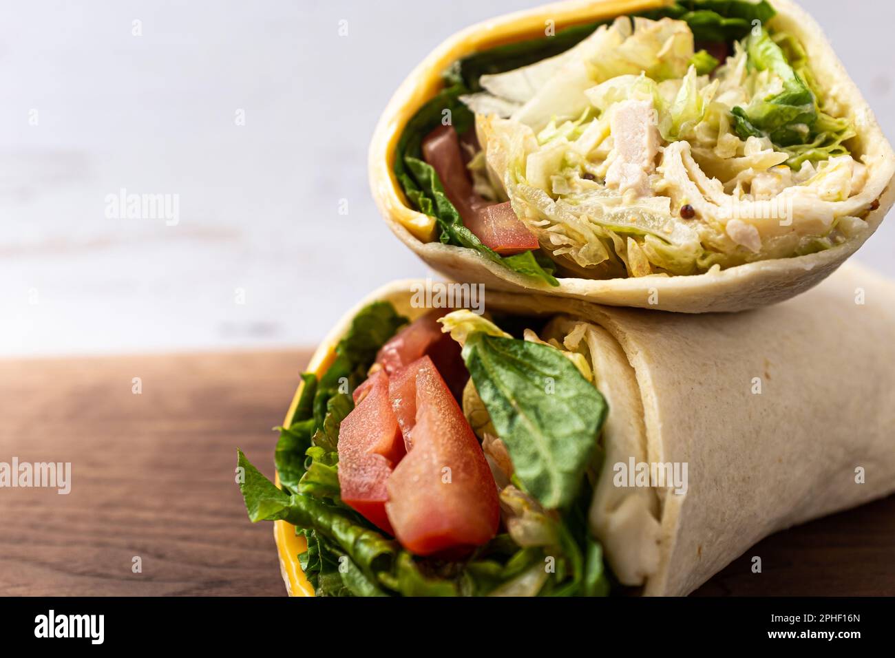 Chicken Wrap with Fresh Vegetables and Chicken Wrapped in Tortilla ...