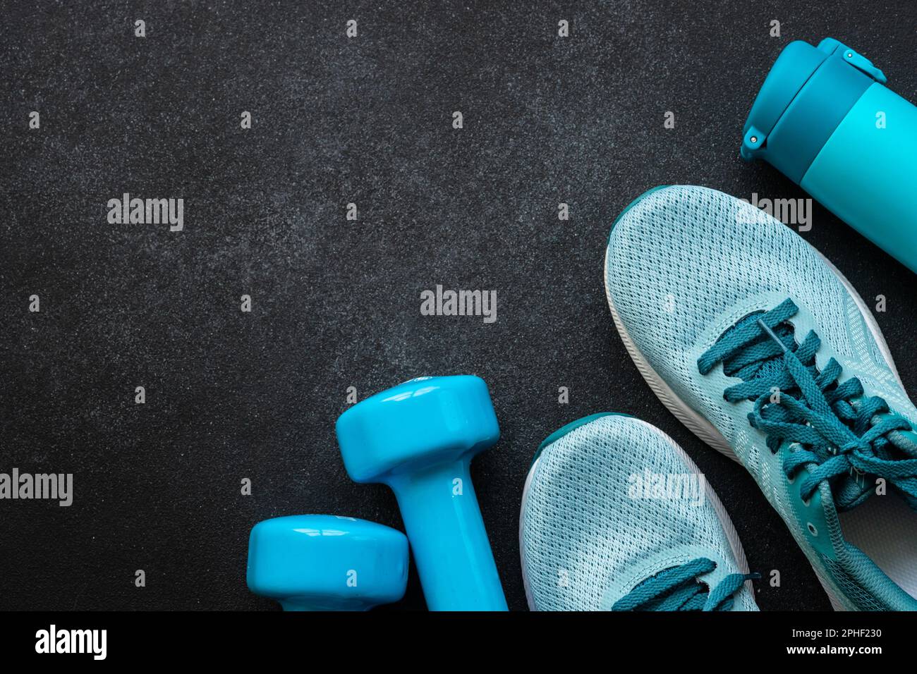 Fitness equipment at black background top view Stock Photo - Alamy