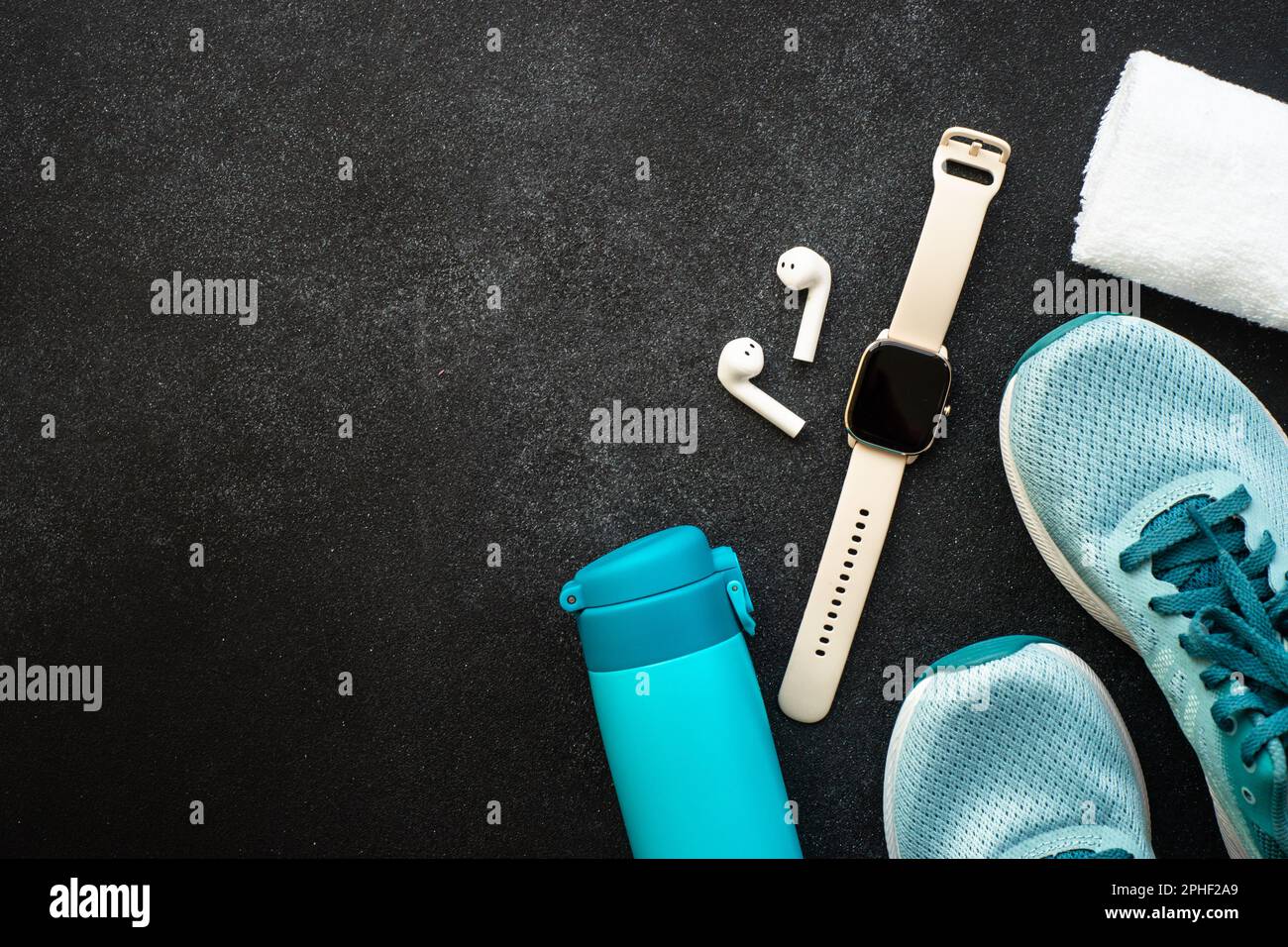 Fitness equipment at black background top view Stock Photo - Alamy