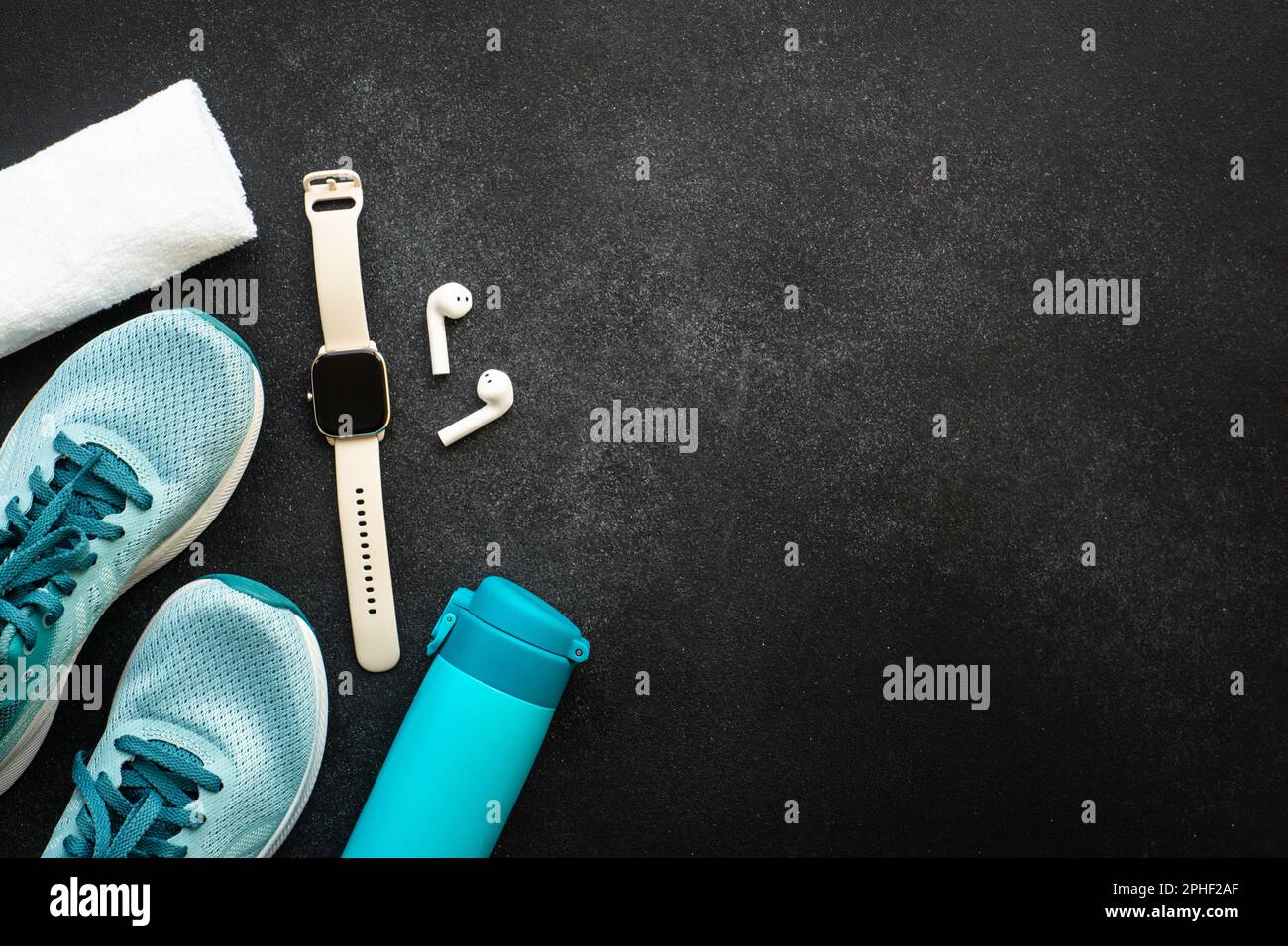 Fitness equipment at black background top view Stock Photo - Alamy