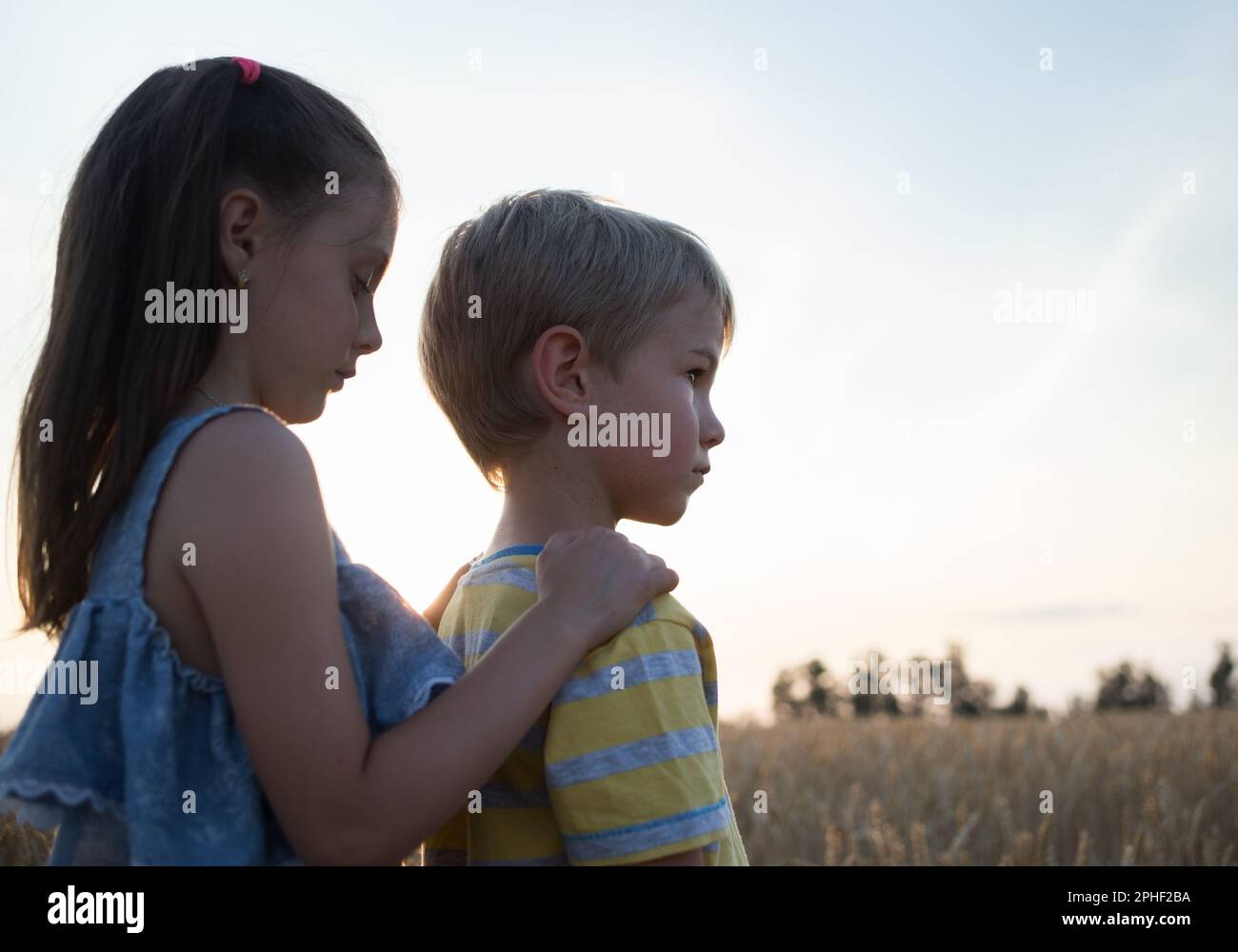 sensual emotional portrait of two sad children in profile, a boy and a ...
