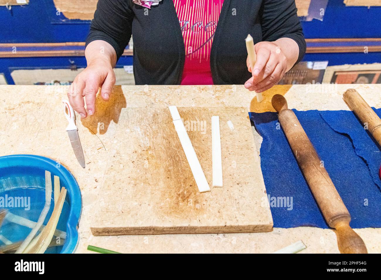 A demonstration of papyrus paper being made by a local Egyptian in Giza ...