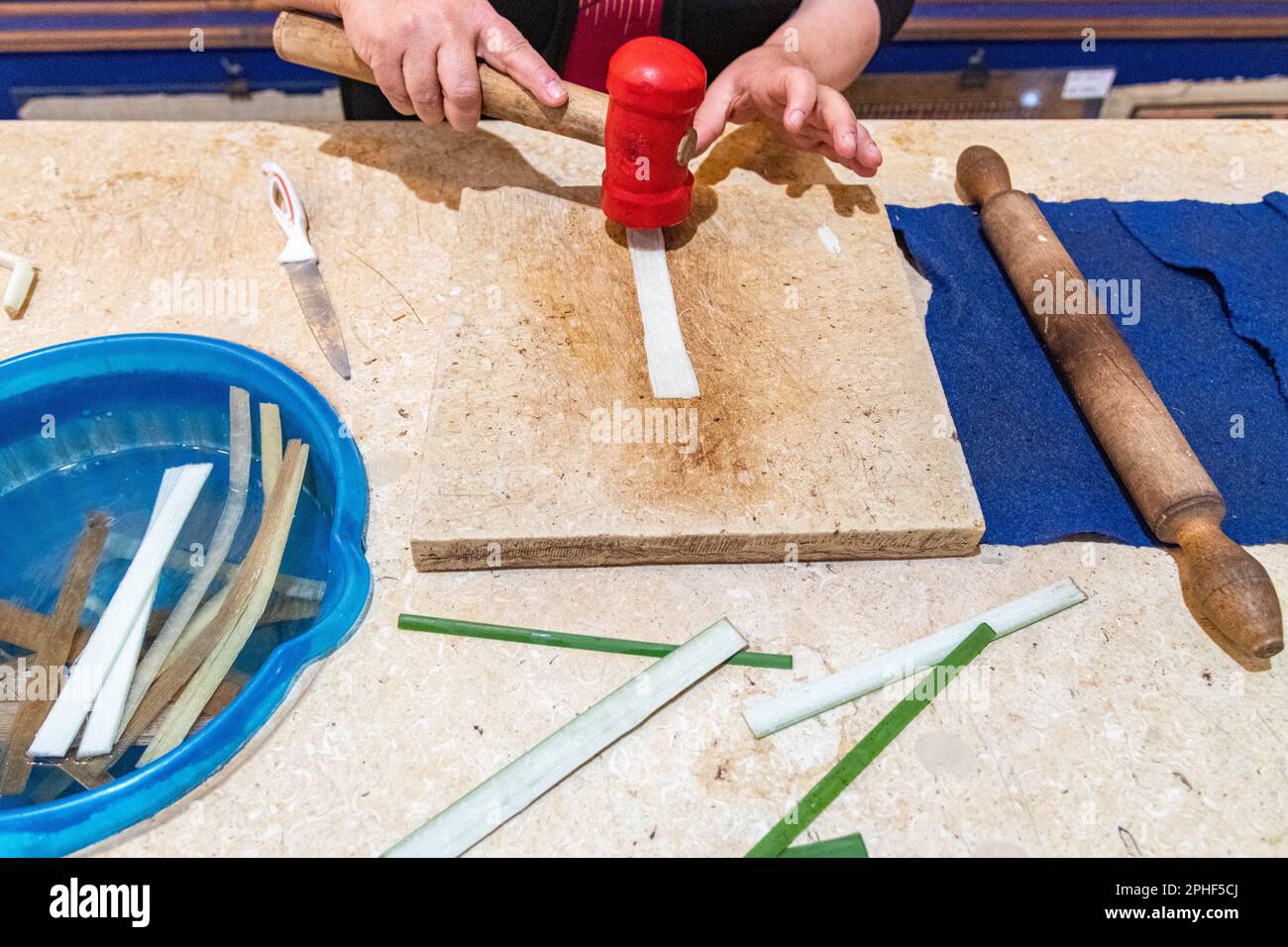 A demonstration of papyrus paper being made by a local Egyptian in Giza ...