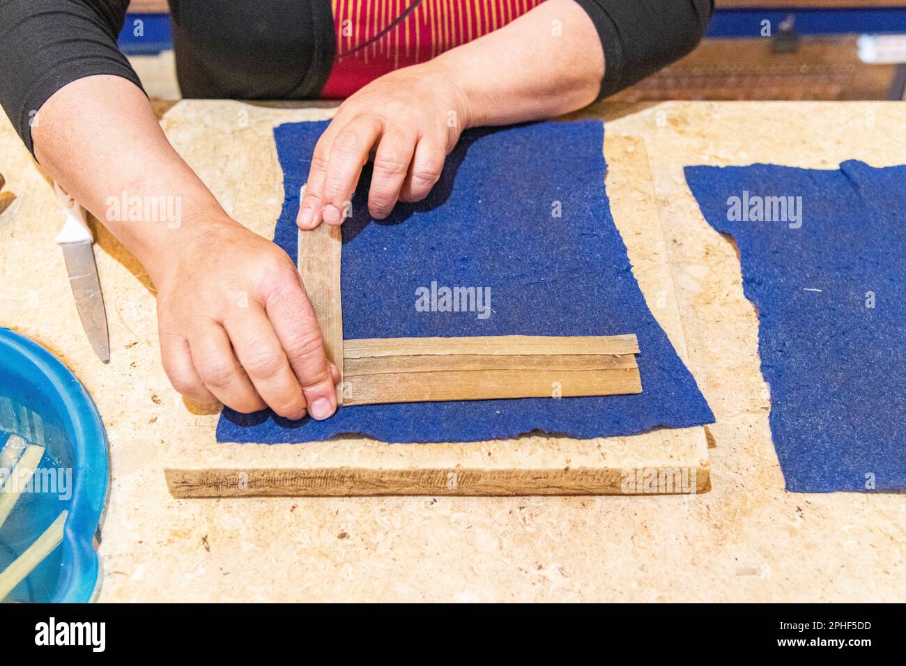 A demonstration of papyrus paper being made by a local Egyptian in Giza ...