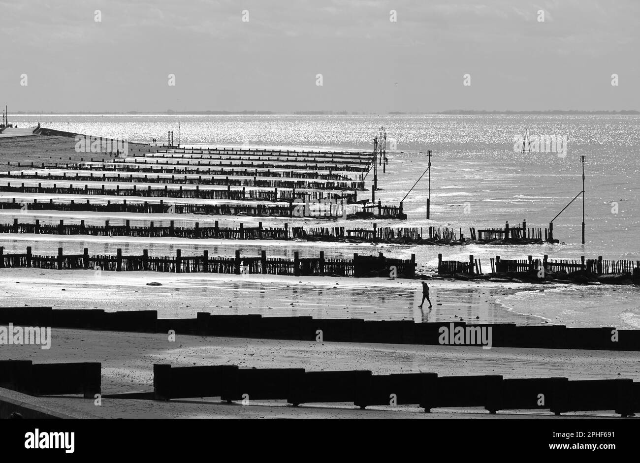 Rows of wooden groynes on the beach at Hunstanton, Norfolk, UK Stock ...
