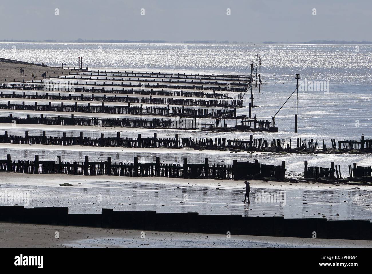 Rows of wooden groynes on the beach at Hunstanton, Norfolk, UK Stock ...