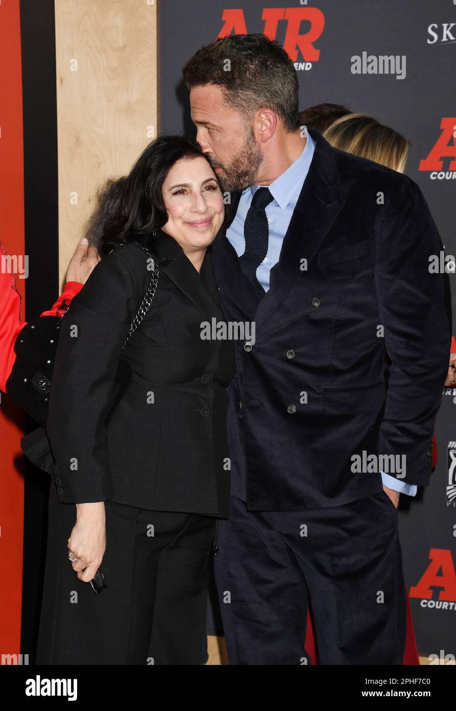 LOS ANGELES, CALIFORNIA - MARCH 27: (L-R) Susan Kroll and Ben Affleck ...