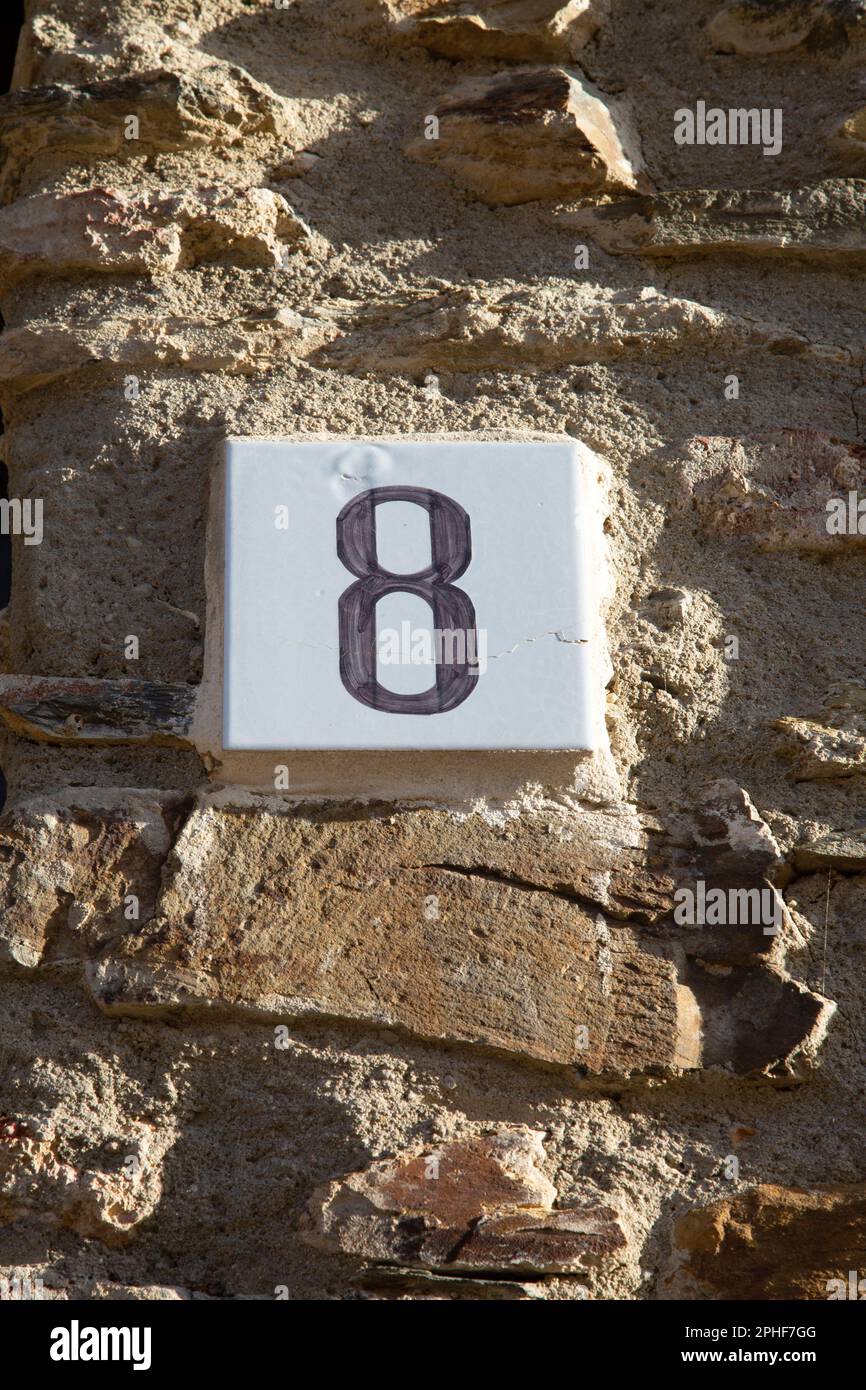 Number Eight on Building Facade Stock Photo - Alamy