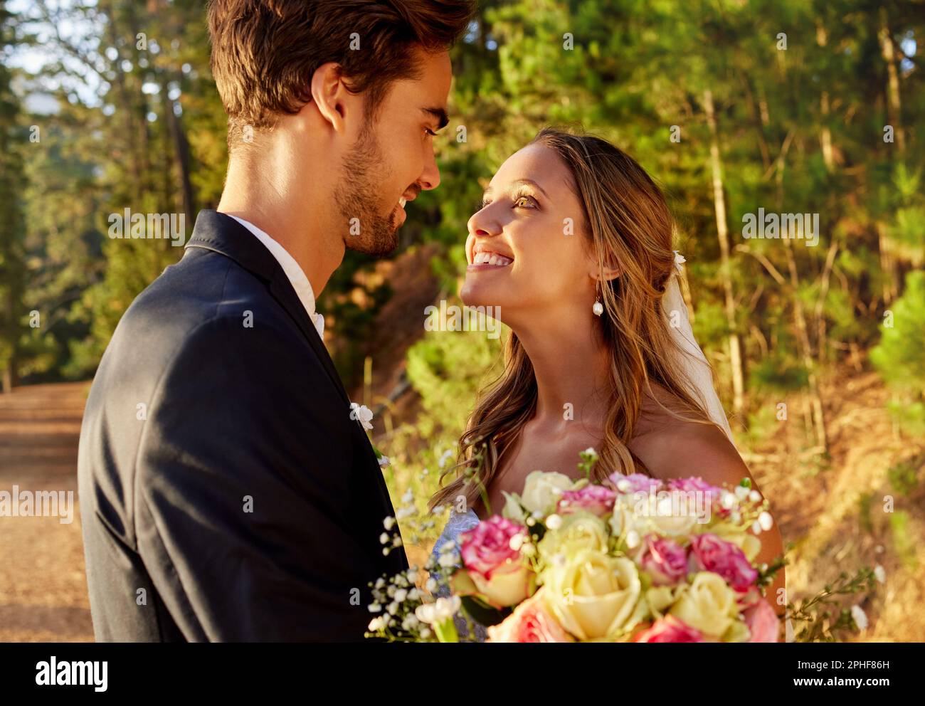 Love, bride and groom with smile, outdoor and cheerful for special day ...