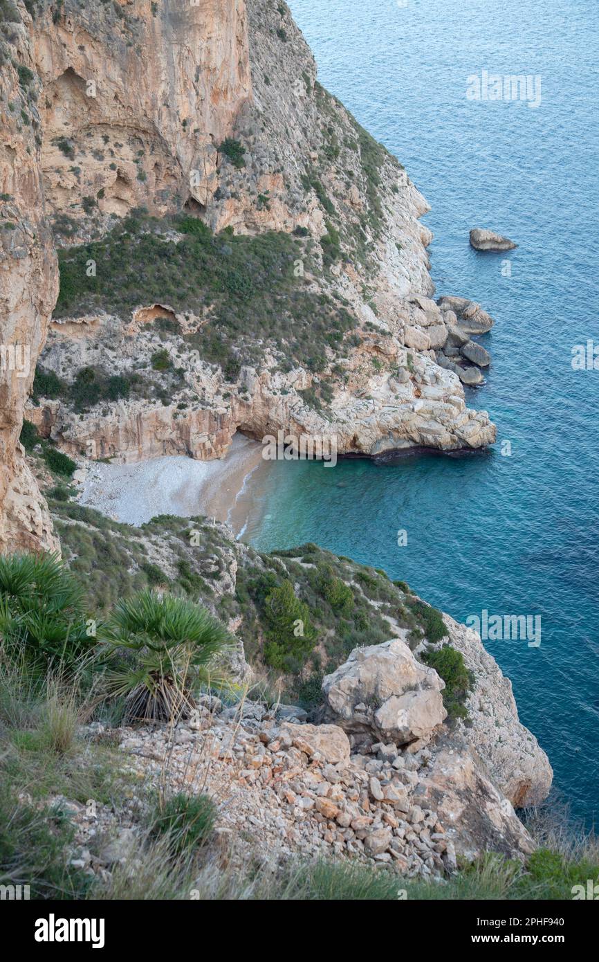 Landscape at Moraig Cove Beach with Cliff; Alicante; Spain Stock Photo ...