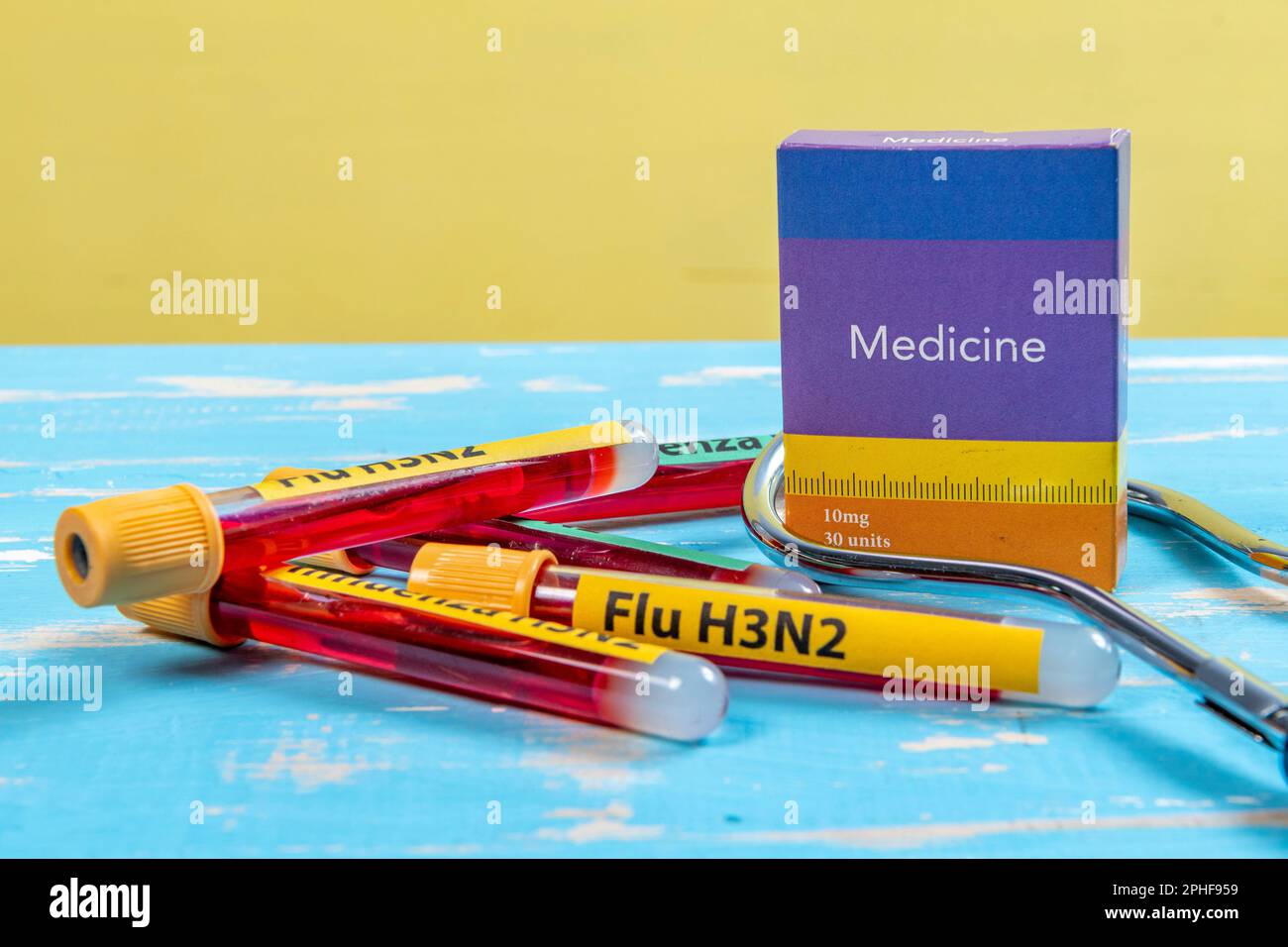 vacuum vials for blood collection written FLU H3N2 in reference to the ...