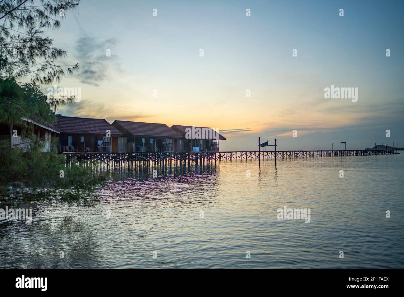 Water houses on the coastline of Saporkren during sunrise at Waisai ...
