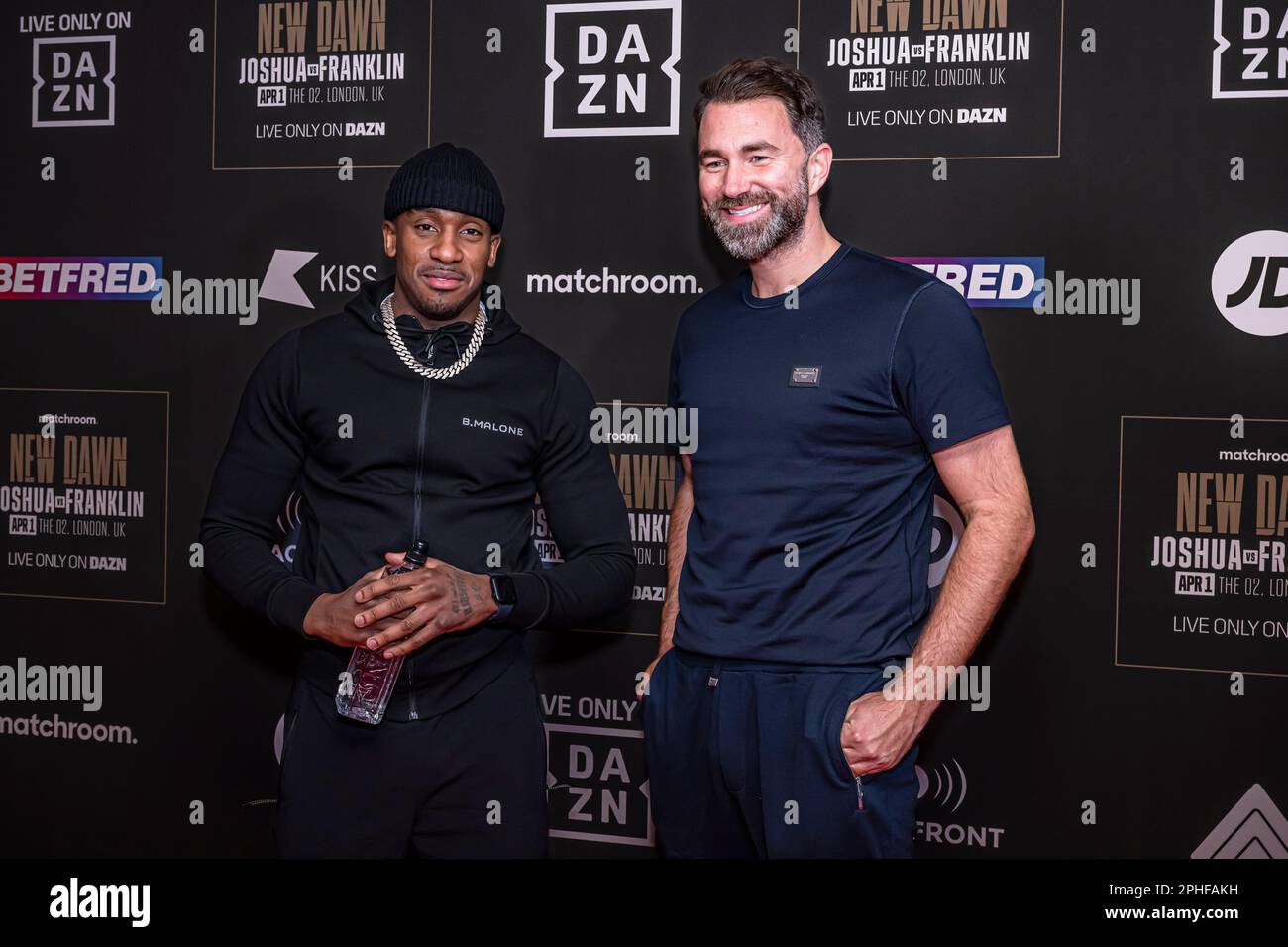LONDON, UNITED KINGDOM. 27th Mar, 2023. Bugzy Malone attends (left) and ...