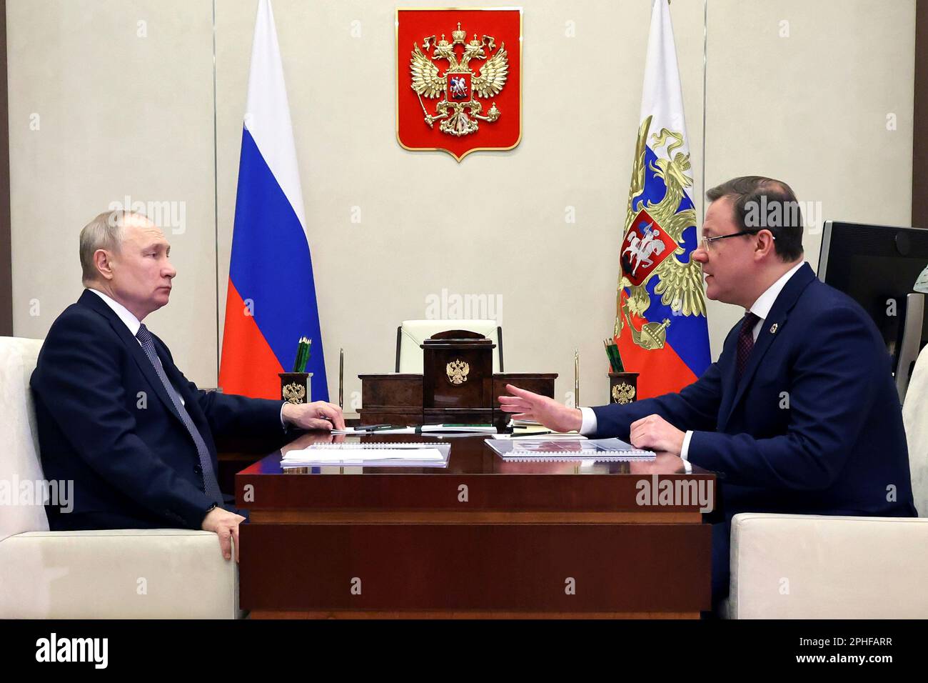 Russian President Vladimir Putin listens to Samara Region Governor ...