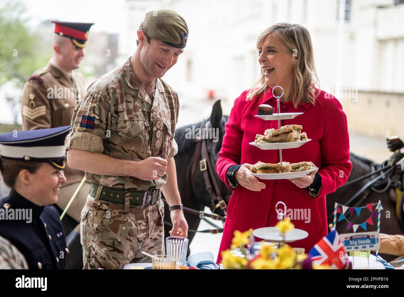 Presenter Mel Geidroyc with members of the Scots Guards and Coldstream ...