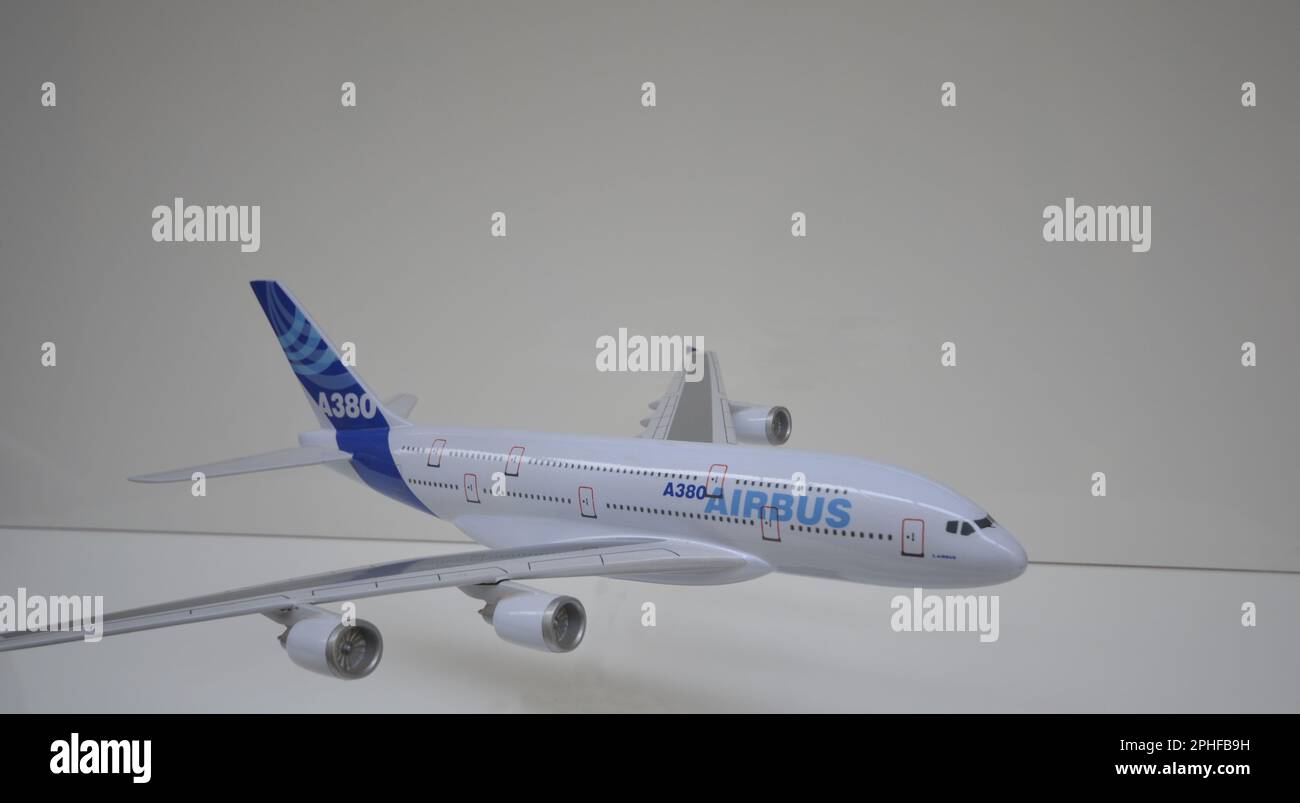 Aircraft model A380 miniature with white and blue paint. White ...