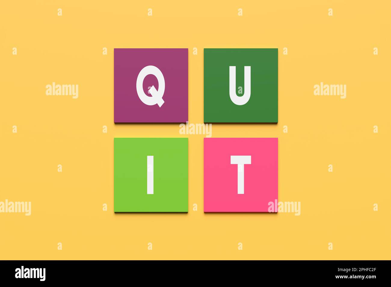 The word quit on colorful square blocks on yellow background. To quit ...