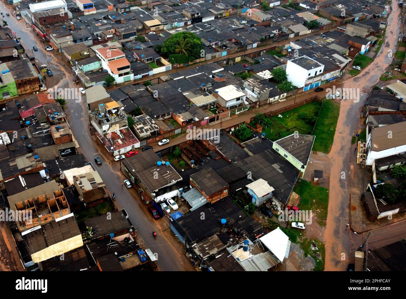 Streets are flooded by rain in the Sol Nascente favela of Brasilia ...