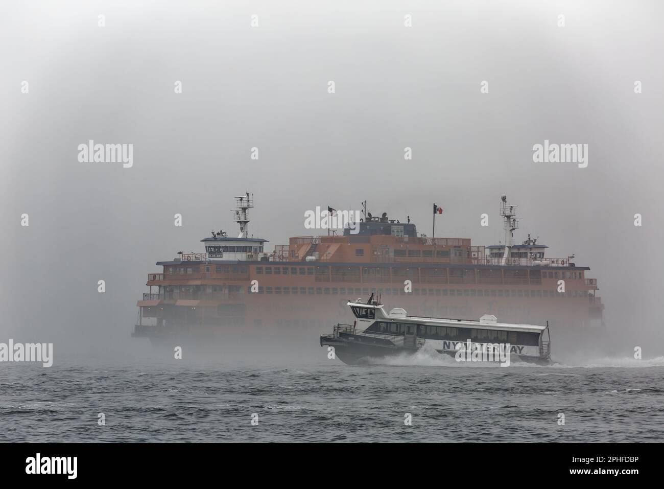 The bright orange Staten Island Ferry John J. Marchi dwarfs other ...