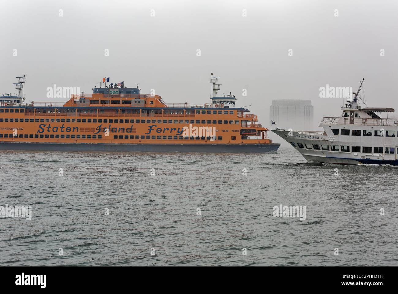 The bright orange Staten Island Ferry John J. Marchi dwarfs other ...