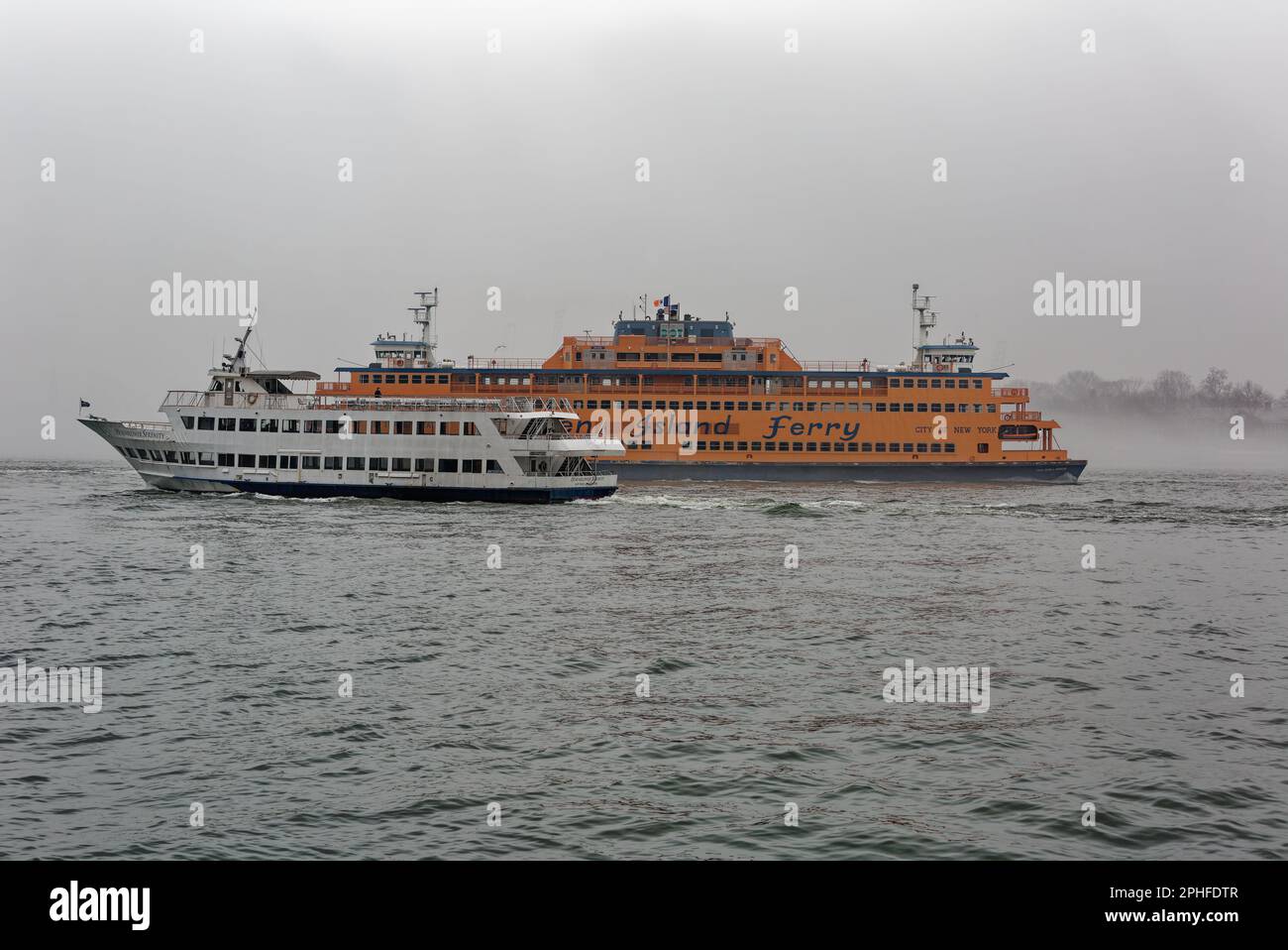 The bright orange Staten Island Ferry John J. Marchi dwarfs other ...