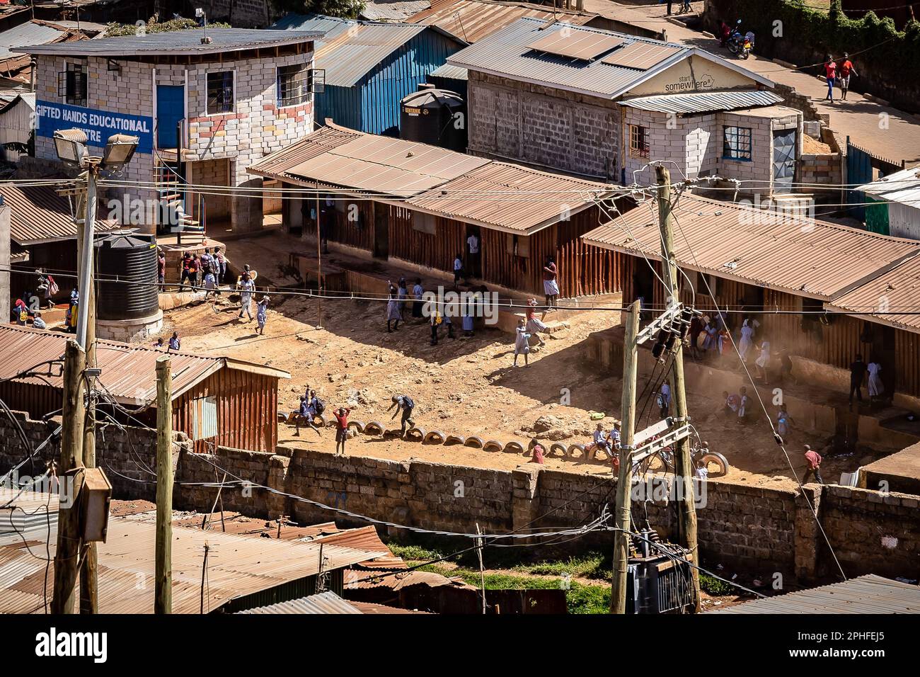 Children playing in a school of Kibera slum, Nairobi, Kenya. Kibera is ...