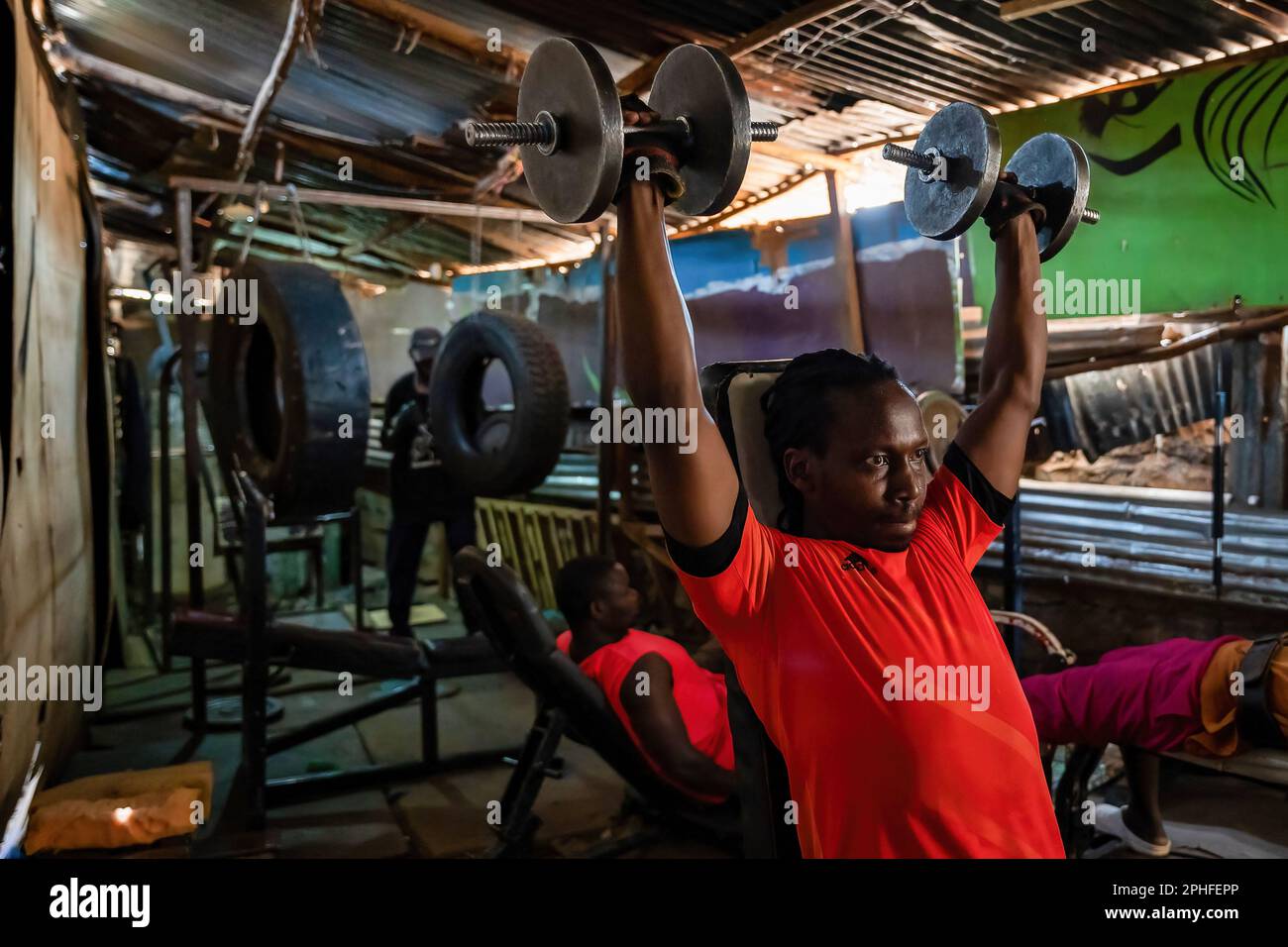 People training in the gym built inside a shack of Kibera slum. Kibera ...