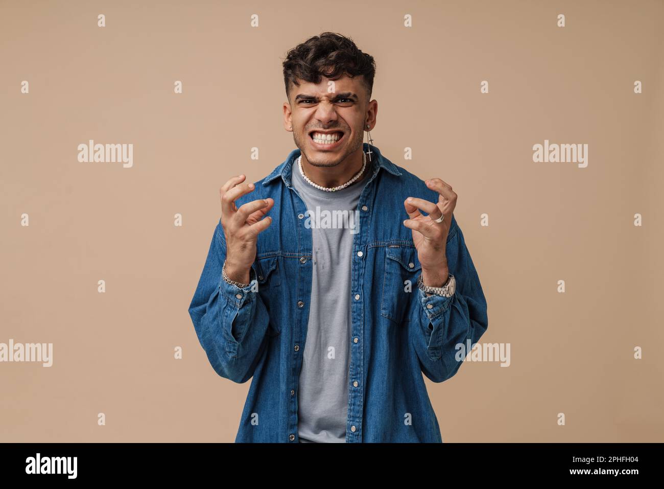 Man with clenched teeth hi-res stock photography and images - Alamy