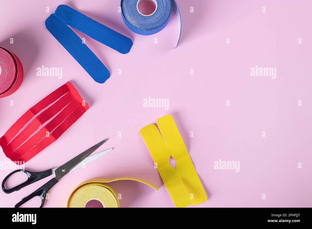 Rolls kinesiology tape in shape of lantern, letters X and V for ...