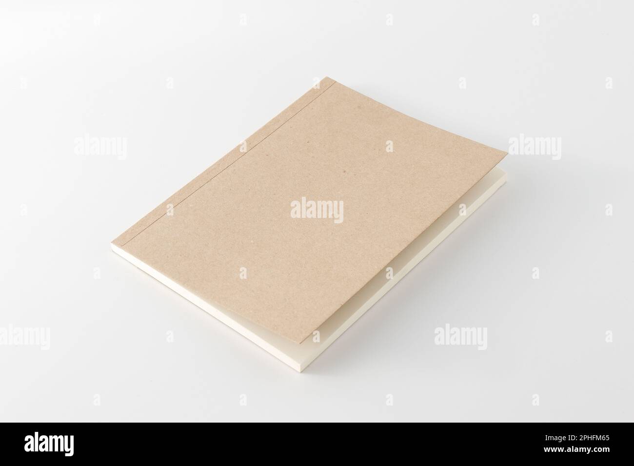 Recycled paper book on white background Stock Photo - Alamy