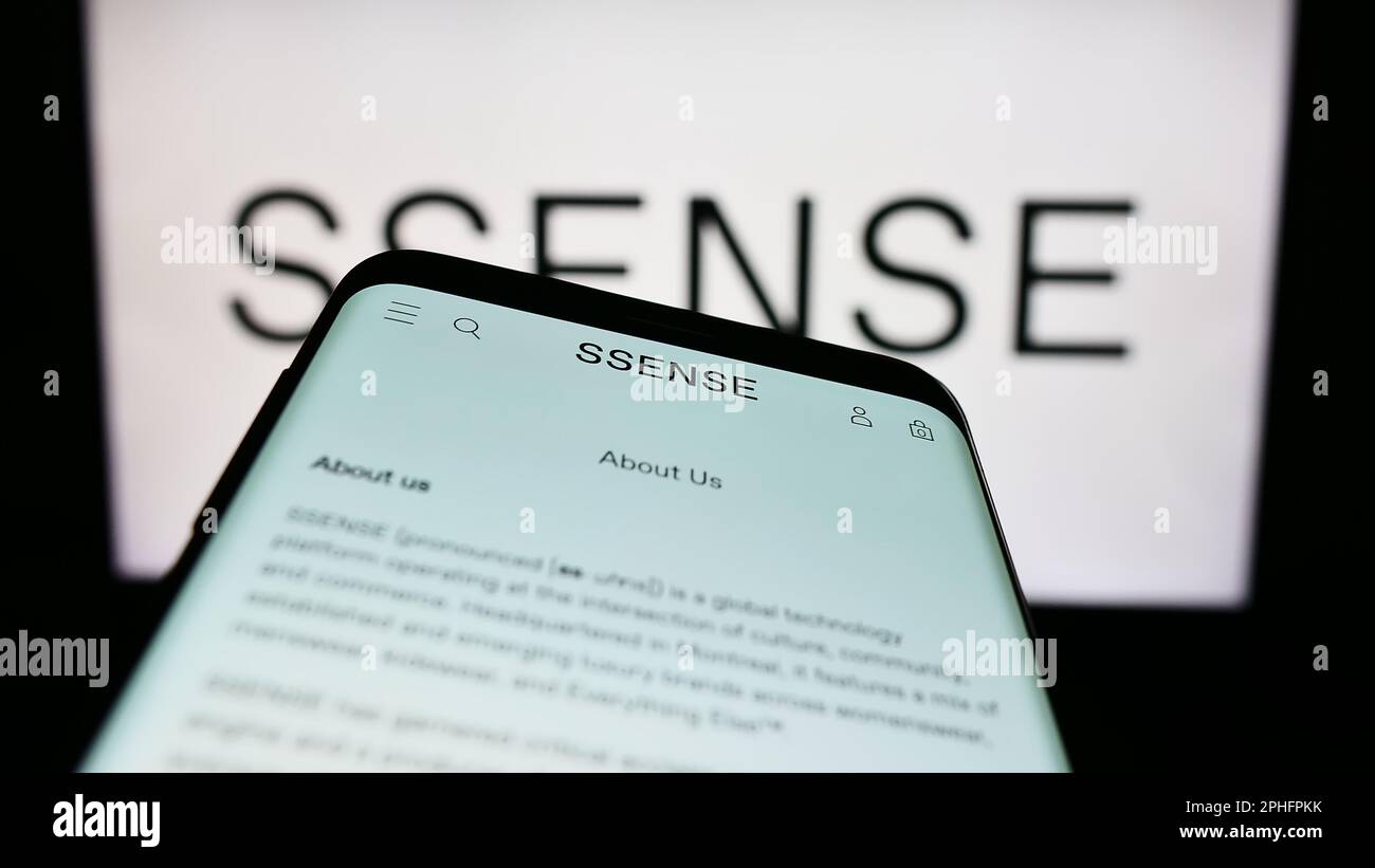 Mobile phone with website of Canadian e-commerce company SSENSE on ...