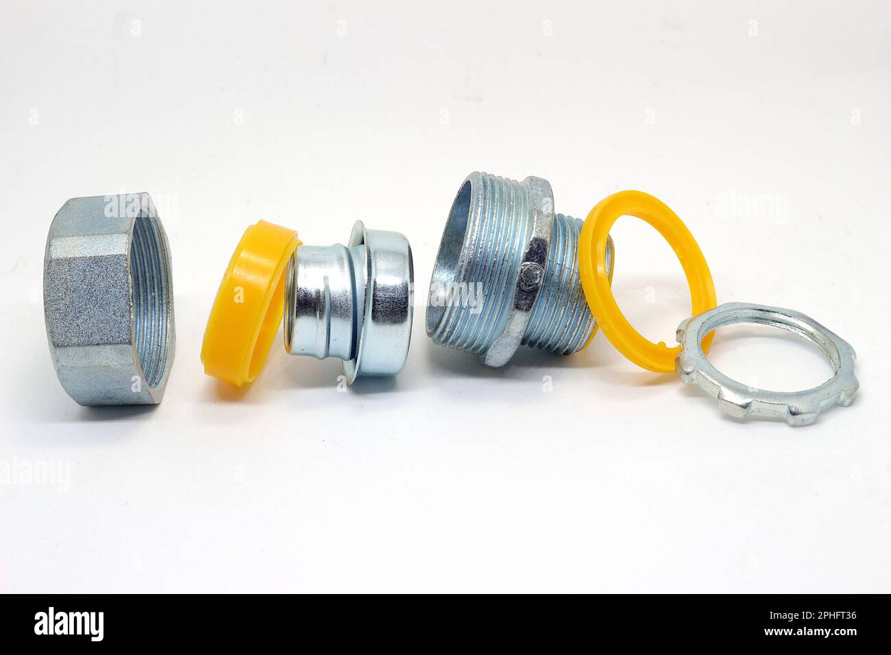 The steel cable gland is detached to reveal the internal components ...