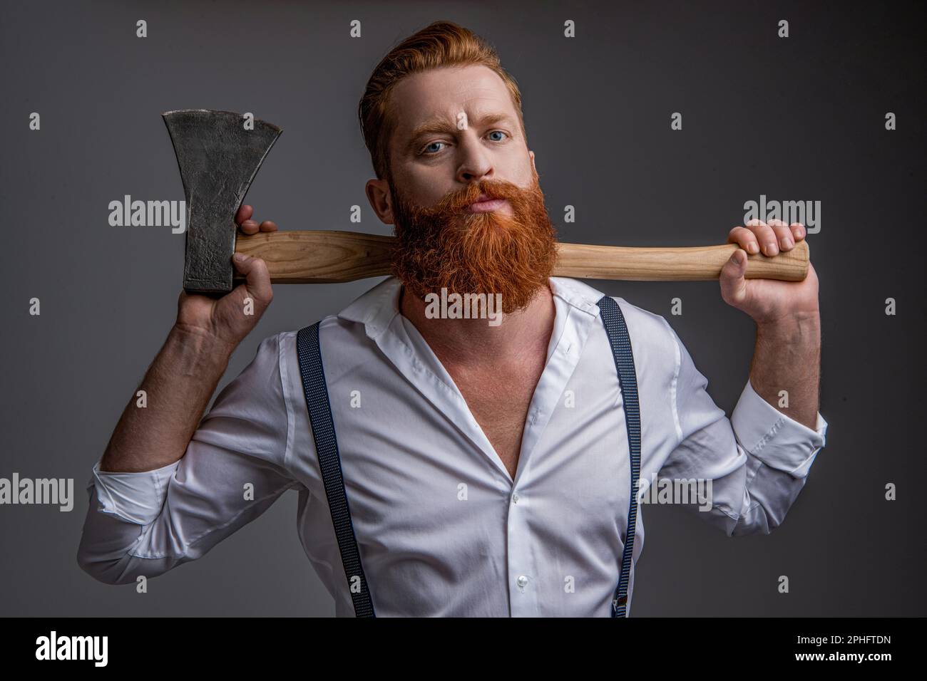 masculinity of bearded man with axe in studio. masculinity of man with ...