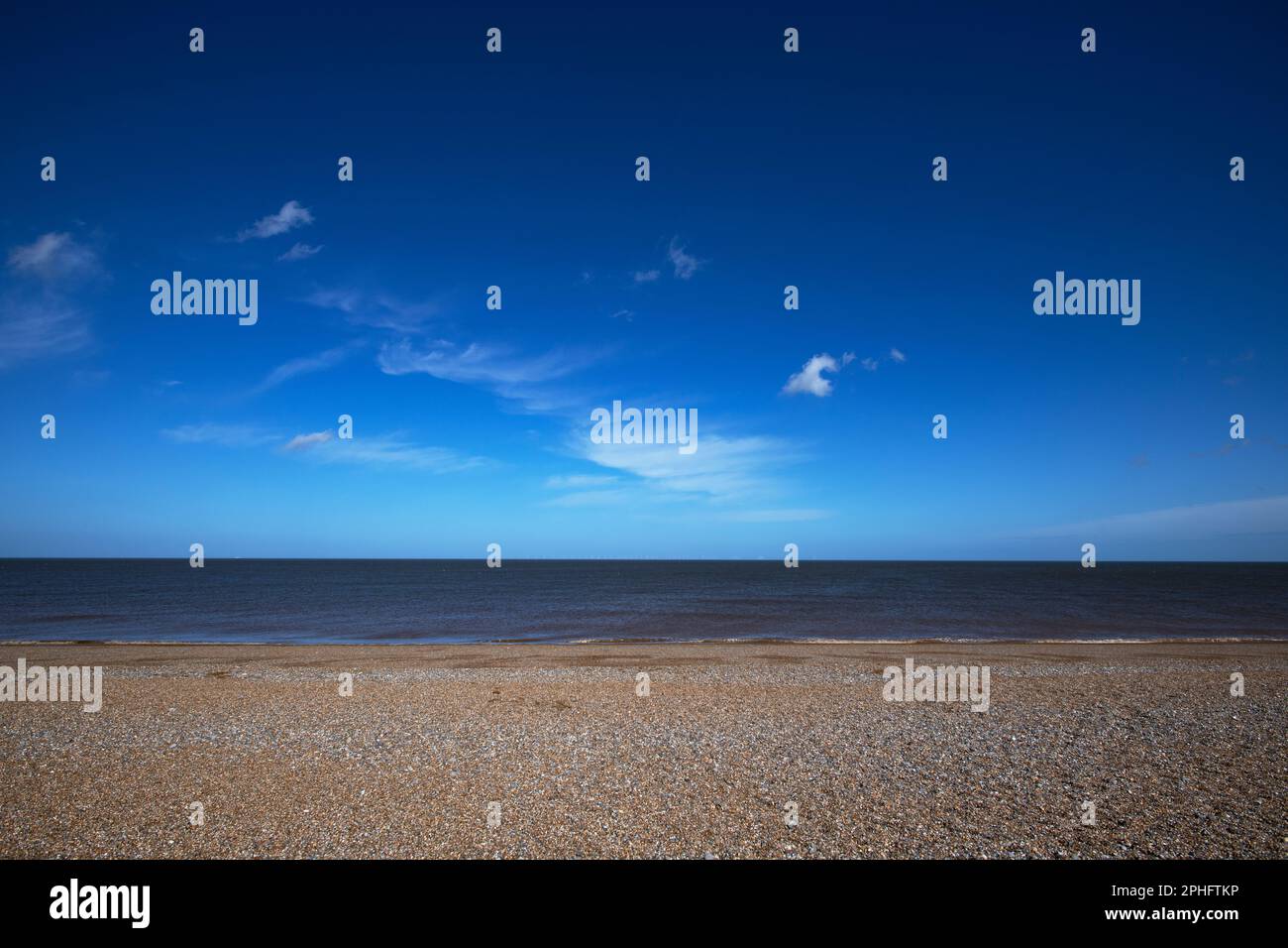 Norfolk Marshes Norfolk England March 2023 Cley Beach with blue sky ...