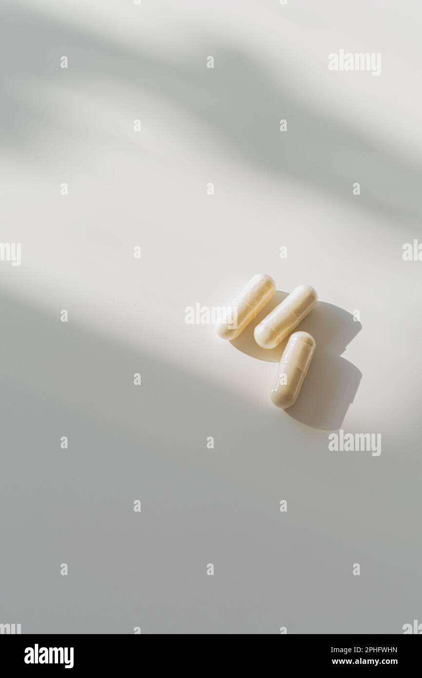 Vitamins on a white background. Pill capsules on a white background ...