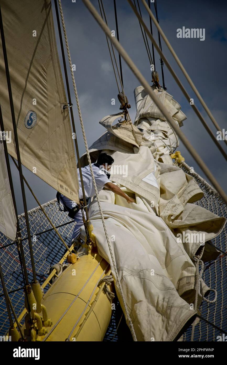15Feb2023 Barbados Caribbean Crewman of Royal Clipper handling sails on ...