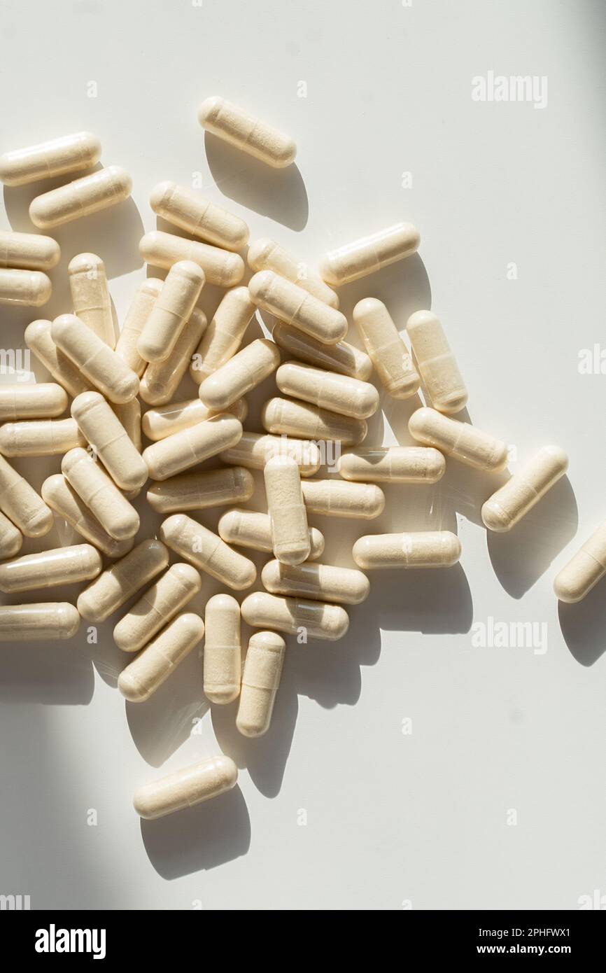 Vitamins on a white background. Pill capsules on a white background ...