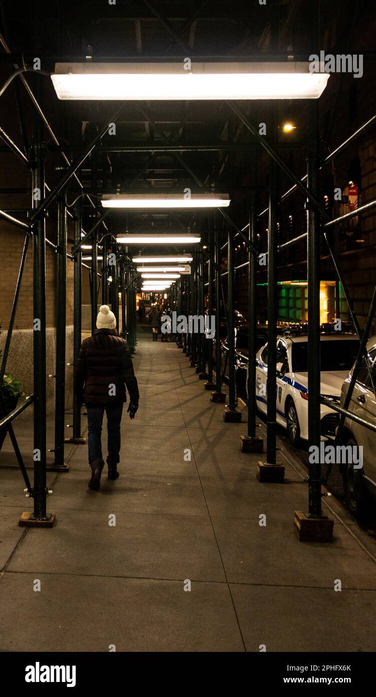 Girl walking the street alone at night hi-res stock photography and ...