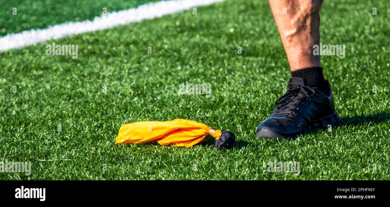 American football yellow flag hi-res stock photography and images - Alamy