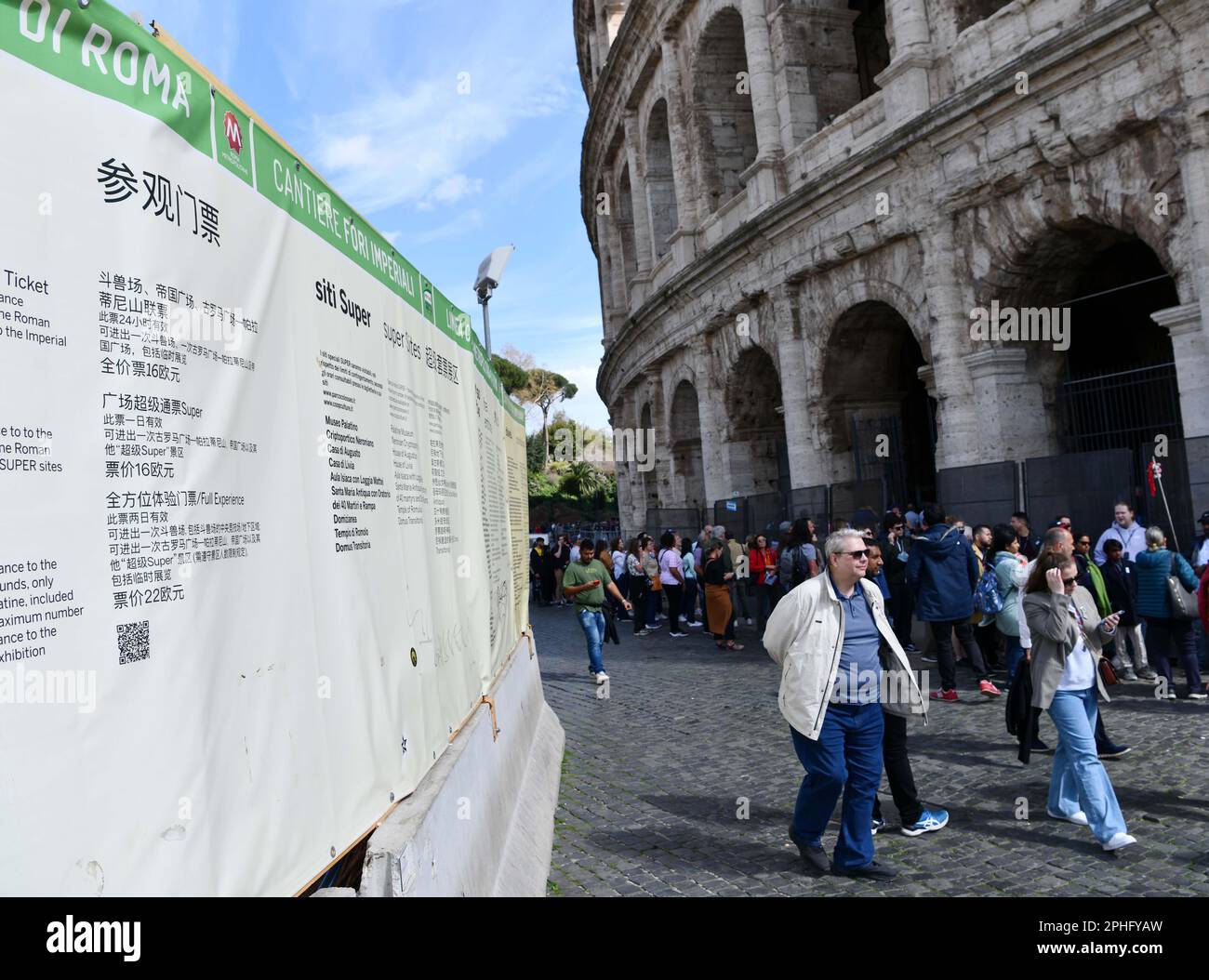 Rome, Italy. 26th Mar, 2023. People walk past tourist information in ...