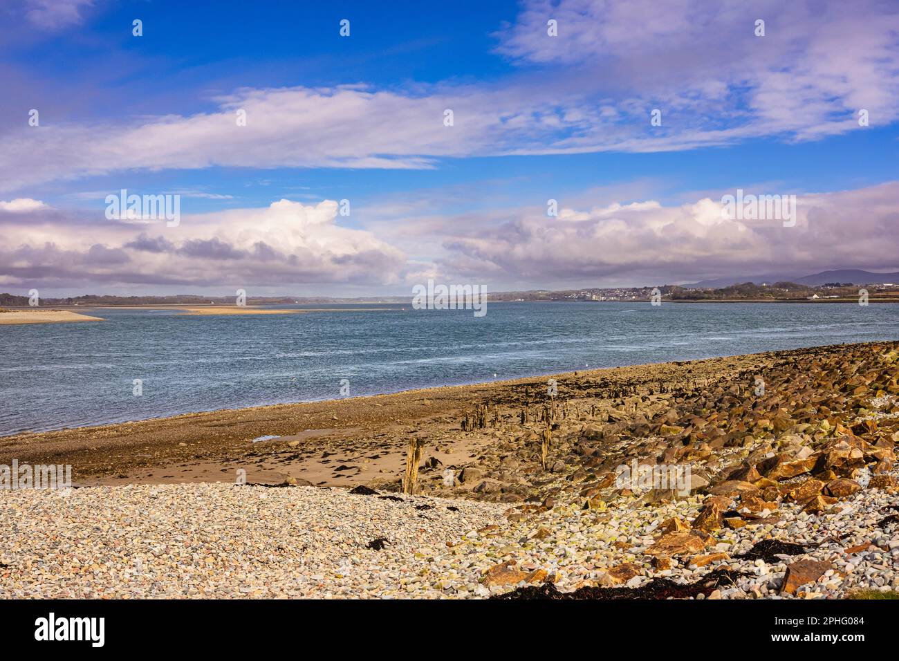 View from Fort Belan beach to Caernarfon along the Menai Strait. Dinas ...