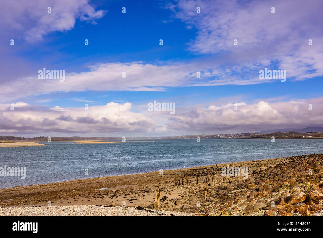 View from Fort Belan beach to Caernarfon along the Menai Strait. Dinas ...