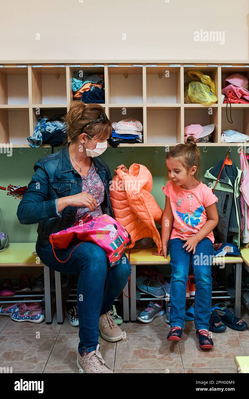 Girl changing clothes hi-res stock photography and images - Alamy