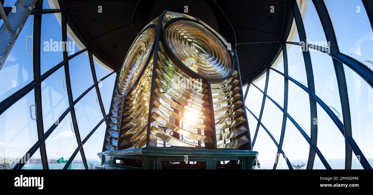 The fresnel lens and bulb at the top of the South Stack lighthouse on ...