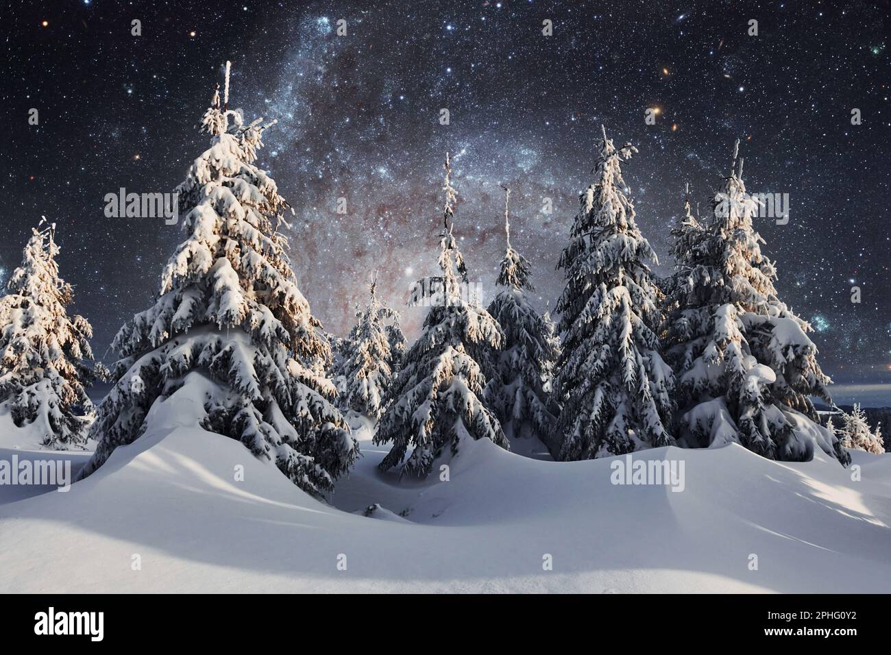 Starry sky in winter snowy night. Big milky way. Majestic landscape ...